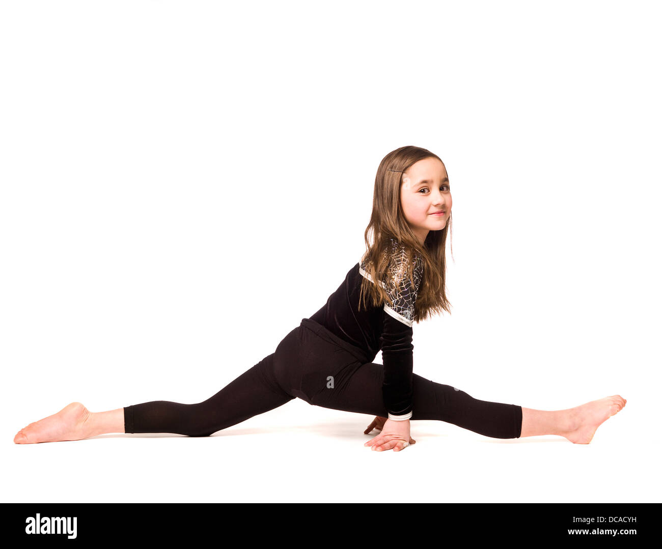 Young girl doing gymnastics Stock Photo - Alamy