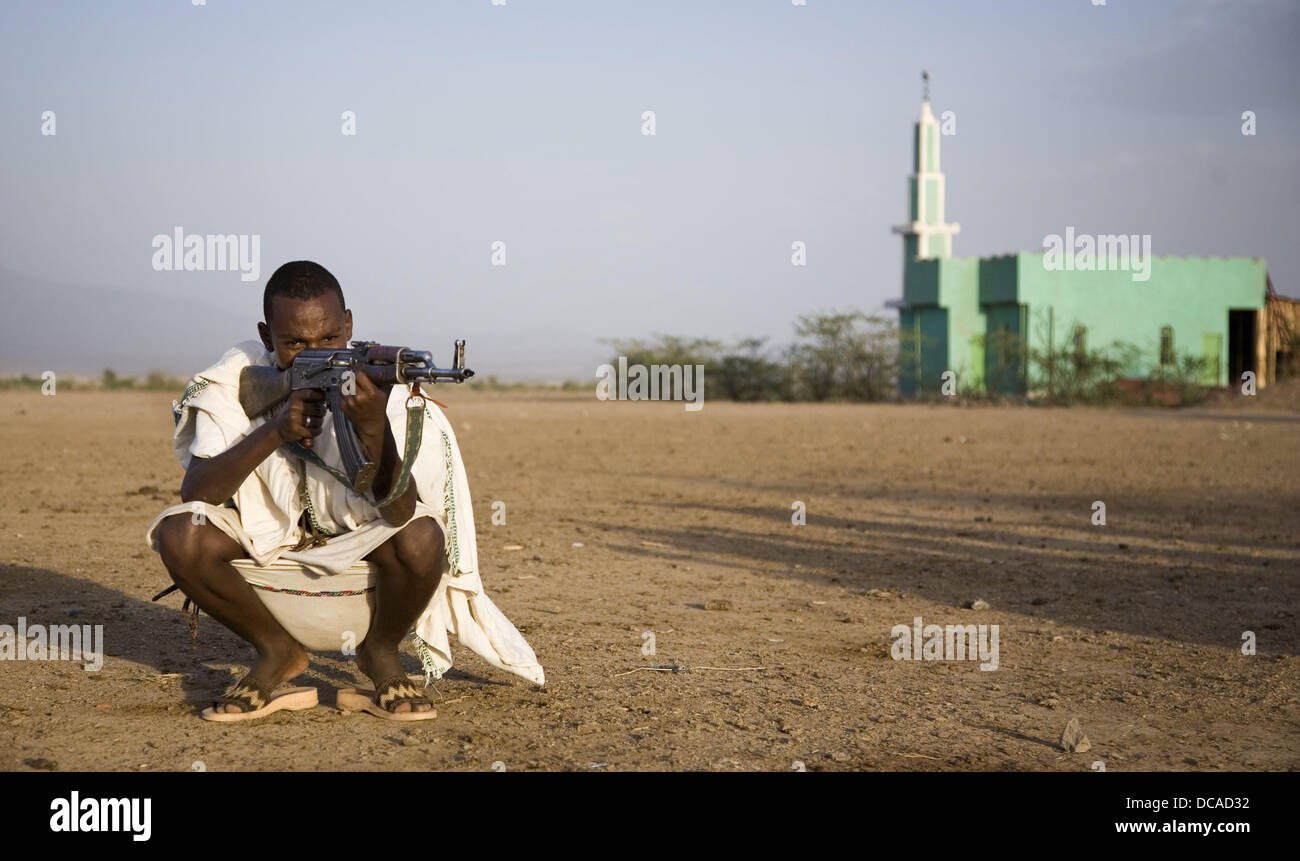 Black man holding gun hi-res stock photography and images - Alamy