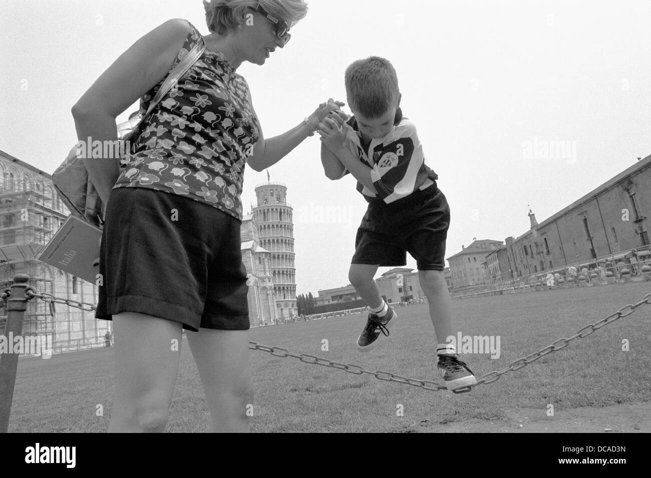 Mother helps son Black and White Stock Photos & Images - Alamy Mother helps son Black and White Stock Photos & Images - Alamy
