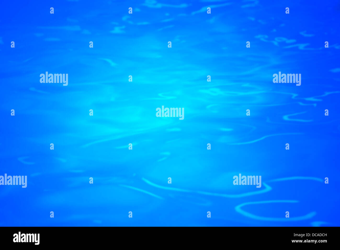 Beautiful blue pool water with reflected light Stock Photo - Alamy