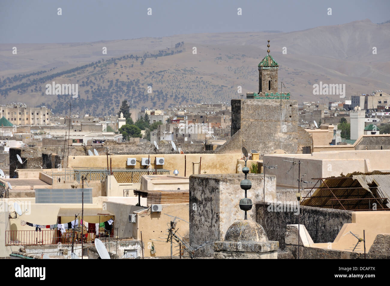 View of Fez medina (Old town of Fes), Morocco with mountain at the ...