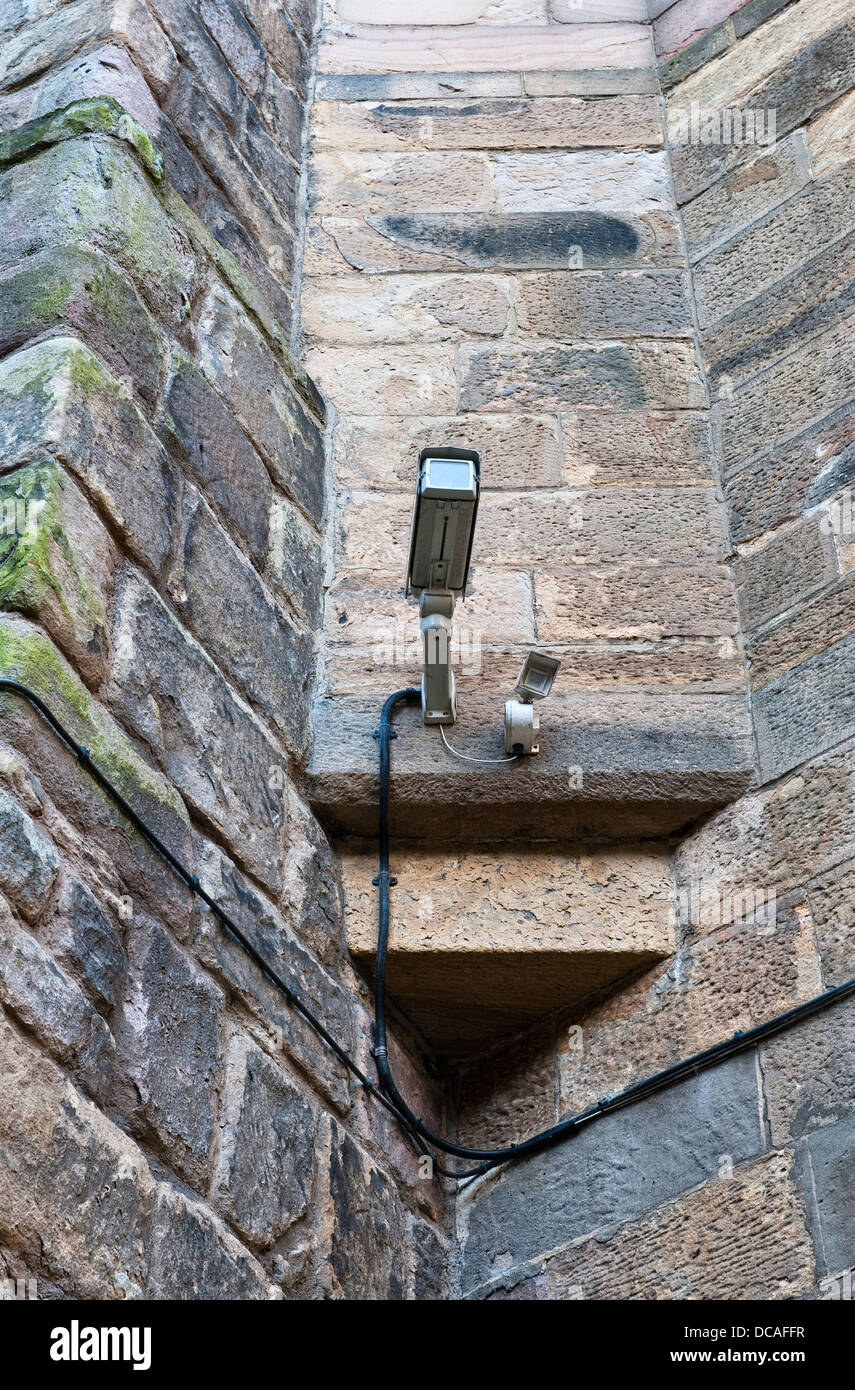 A CCTV security camera on the medieval walls of Lancaster Prison, UK ...