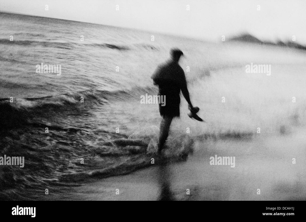 Man walk back view Black and White Stock Photos & Images - Alamy