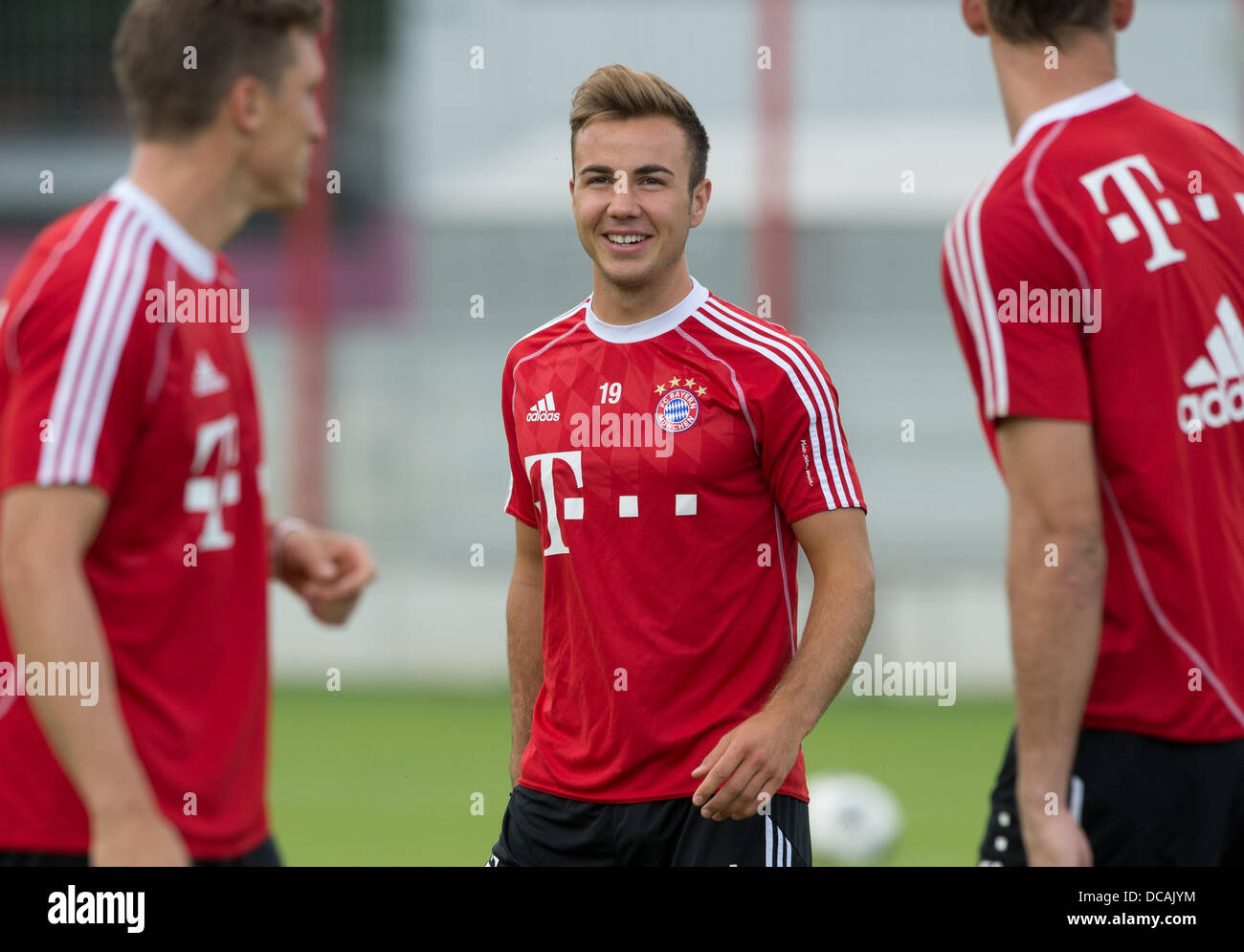 Munich, Germany. 14th Aug, 2013. FC Bayern Munich's Mario Goetze smiles ...