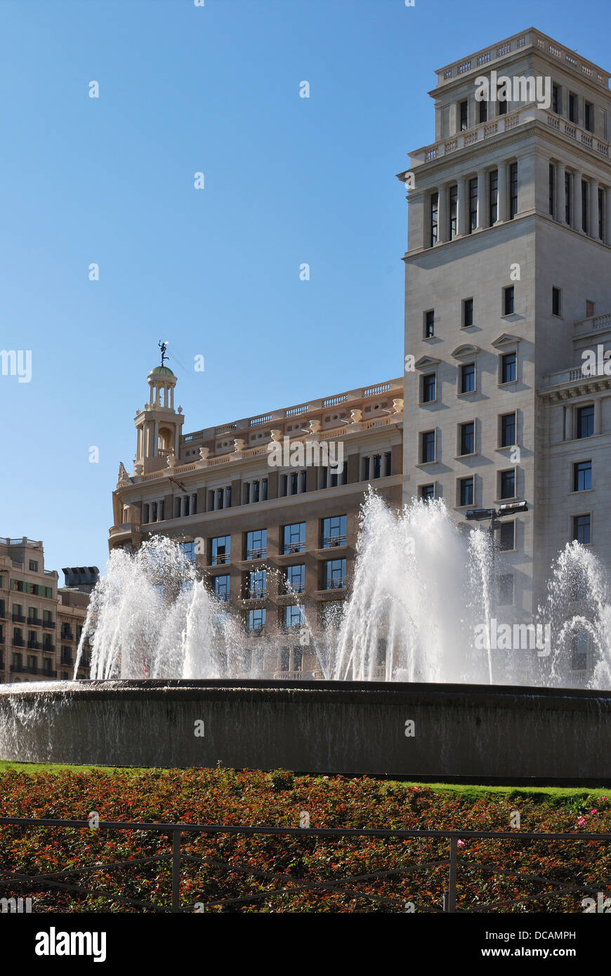 Fountains and buildings in The Placa De Catalunya in the heart of ...