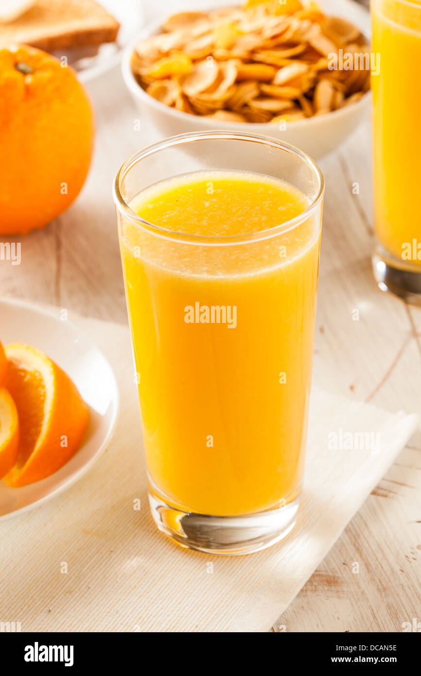 Refreshing Organic Orange Juice at Breakfast Time Stock Photo - Alamy