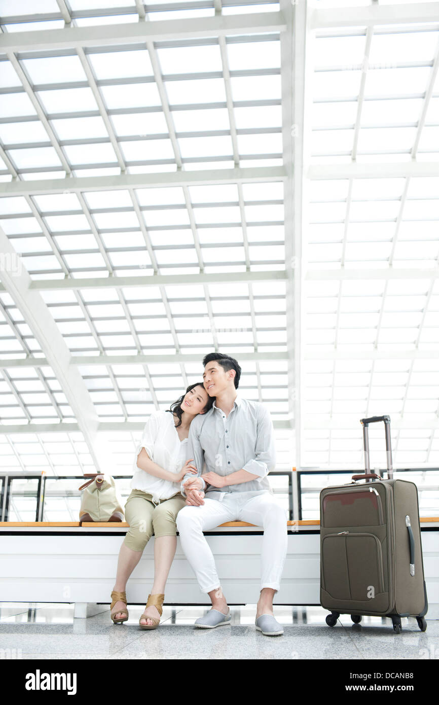 Young couple resting at subway station Stock Photo - Alamy