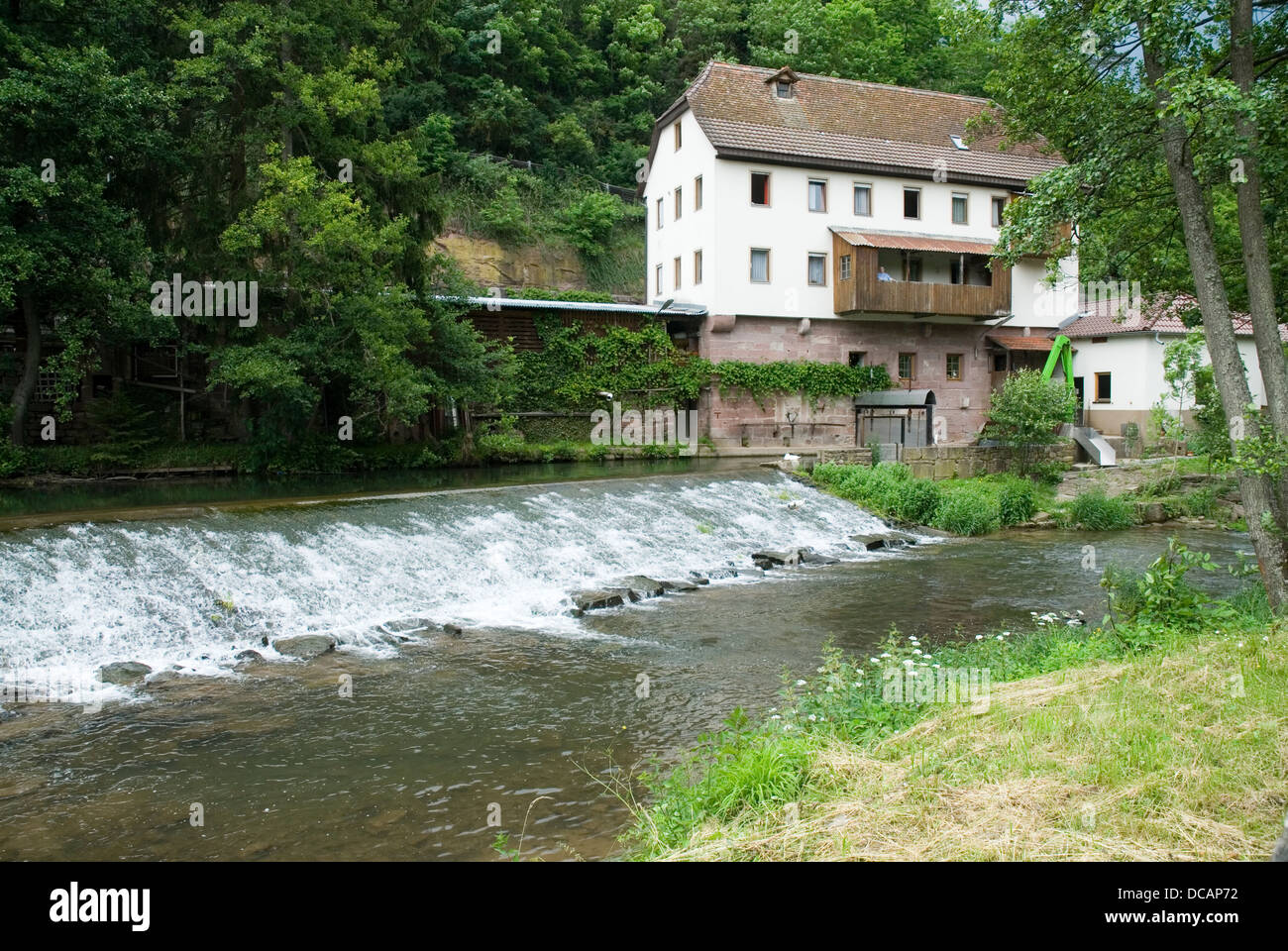 traditional house near the river Stock Photo - Alamy