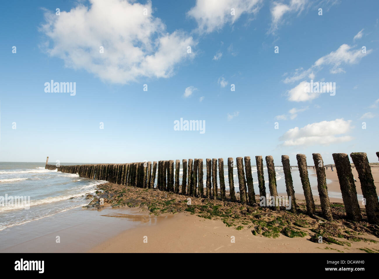Poles at the beach Stock Photo - Alamy