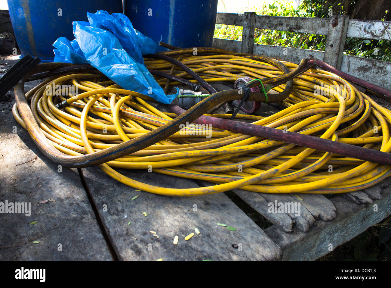 Green rubber watering hose hi-res stock photography and images - Alamy