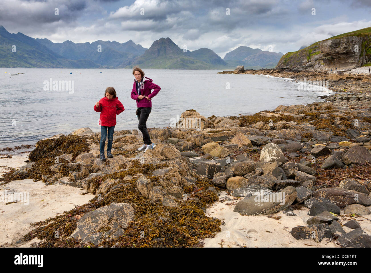 People on the beach at Aird, Ord on the Isle of Skye with views of the ...