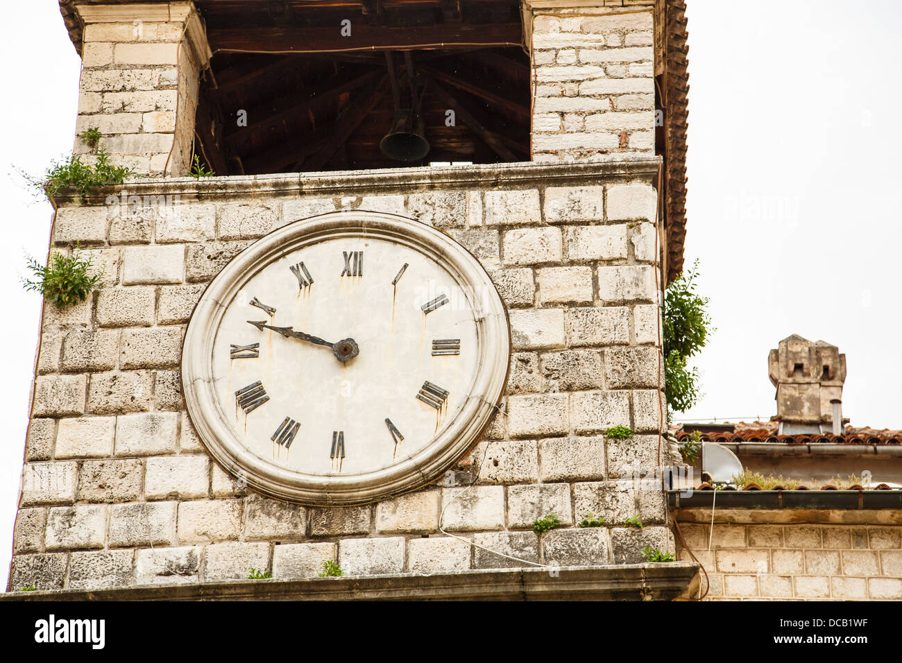 Old stone building clock in hi-res stock photography and images - Alamy