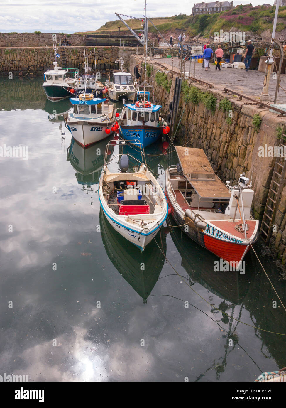 Small inshore fishing boats in harbour in the village of Crail in Fife ...