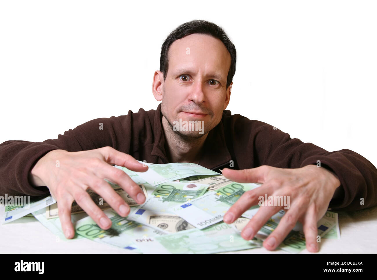 Heap of money Stock Photo - Alamy