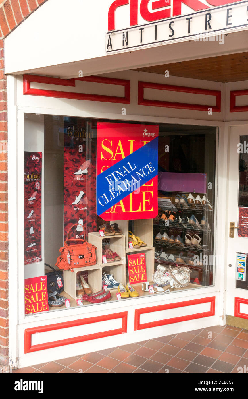 Final stock clearance sale sign poster in shop window UK Stock Photo ...