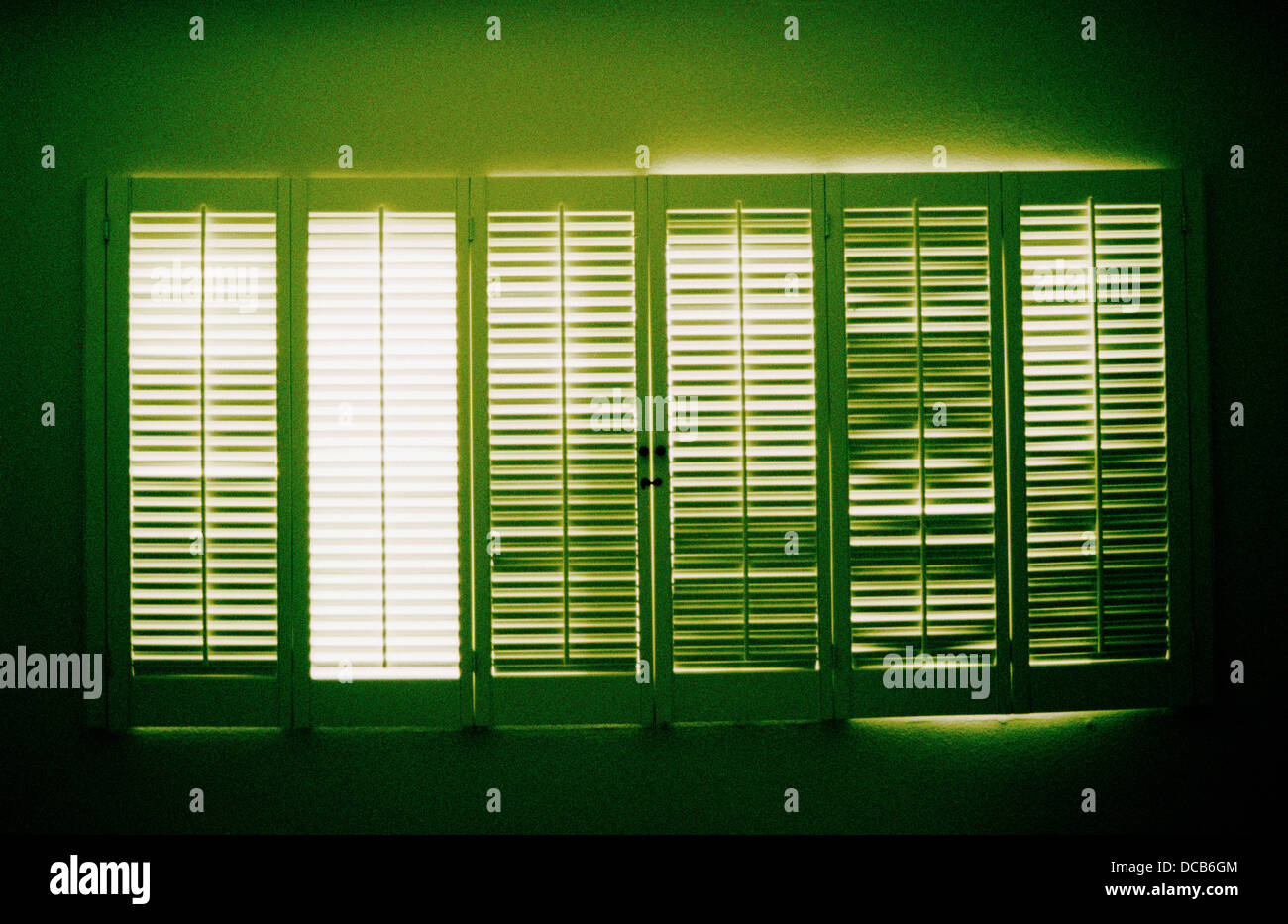 Light coming through window and shutters Stock Photo - Alamy