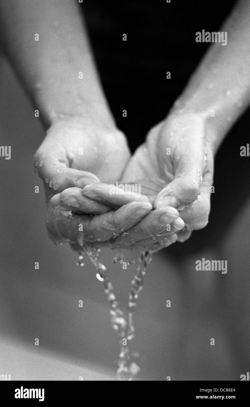 Hand water baptism hi-res stock photography and images - Alamy