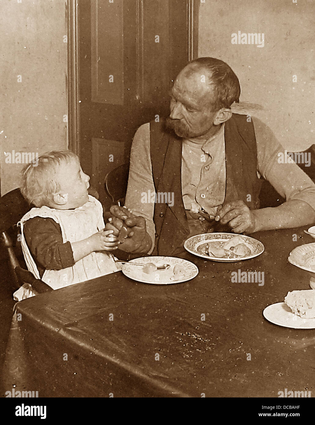Coal Mining Miner and daughter dinner time early 1900s Stock Photo - Alamy