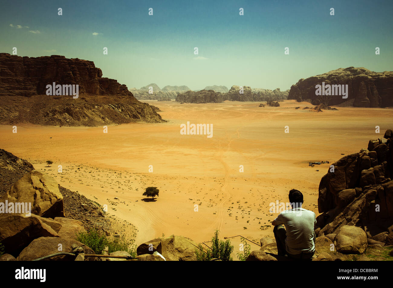 A man rests looking at the amazing view of the desert Stock Photo - Alamy