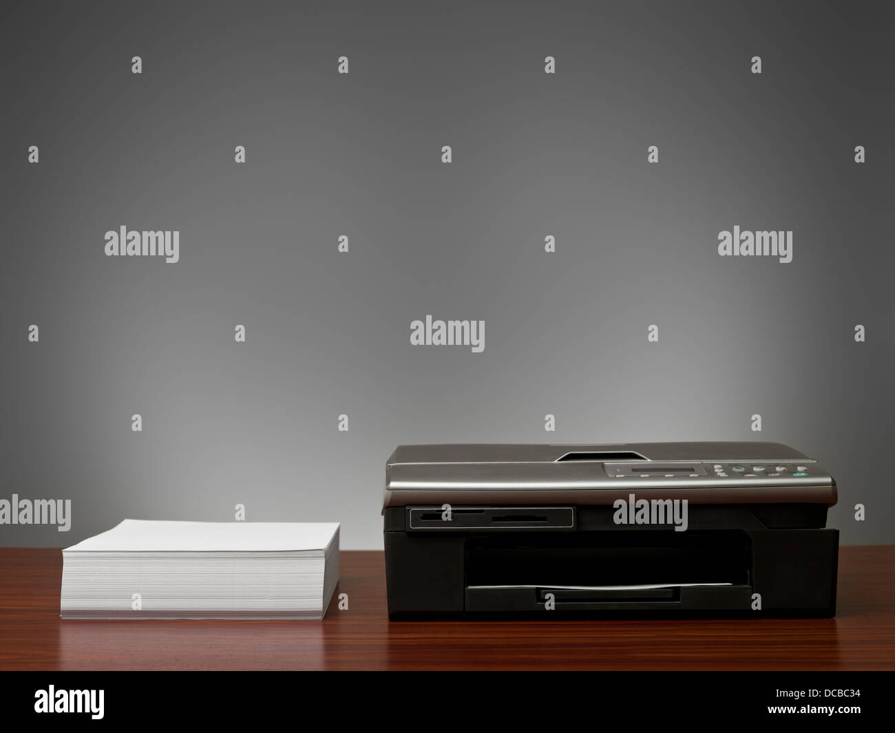 Copy Machine and a stack of papers Stock Photo - Alamy