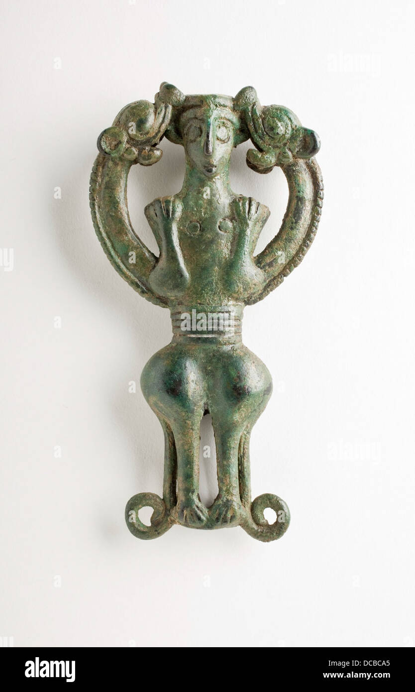 This finial, shaped like the 'Master of Animals', is a piece of ancient ...