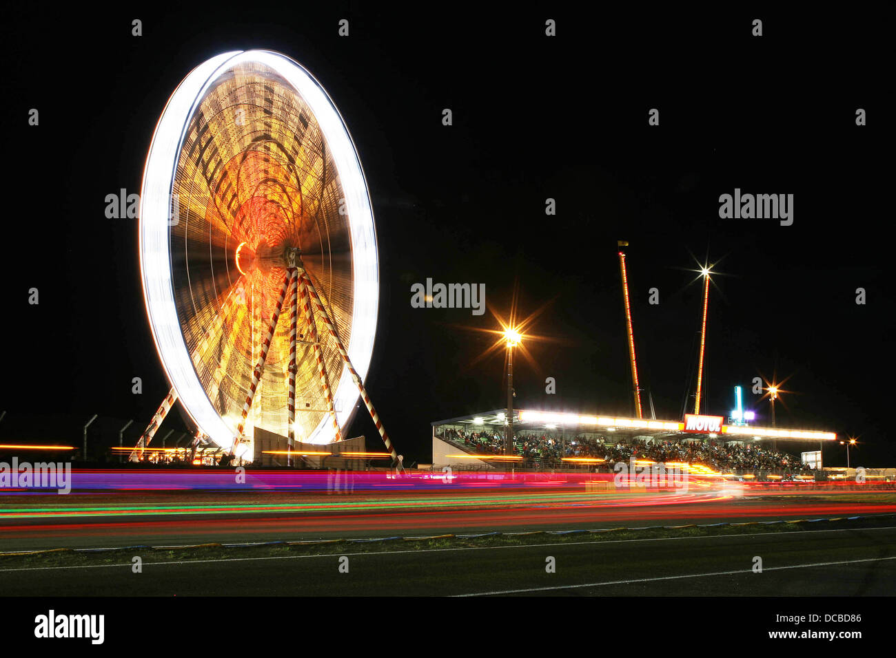 Night racing scene showing the Ferris Wheel at the 2013 Le Mans 24 ...
