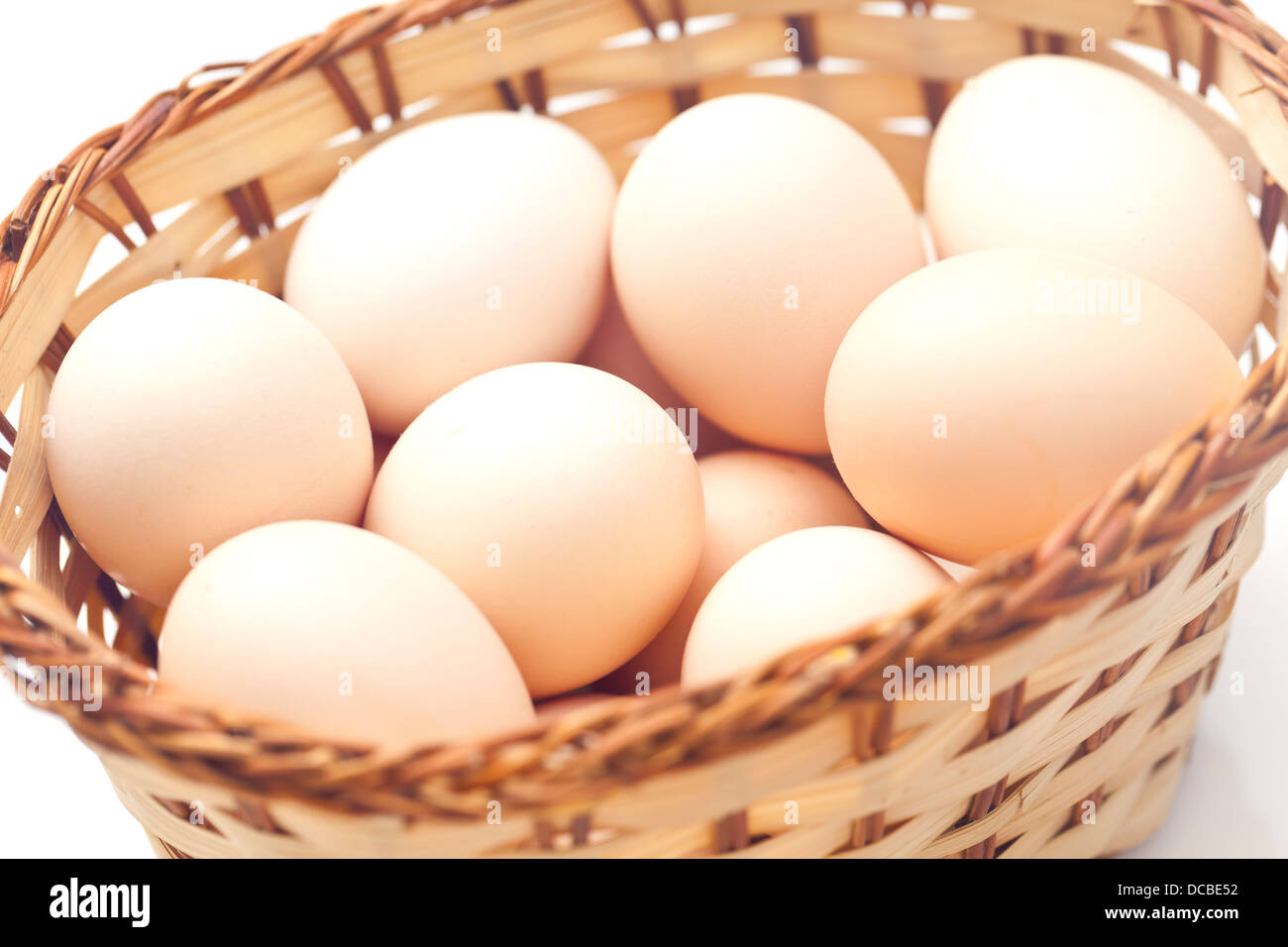 Eggs in basket Stock Photo - Alamy