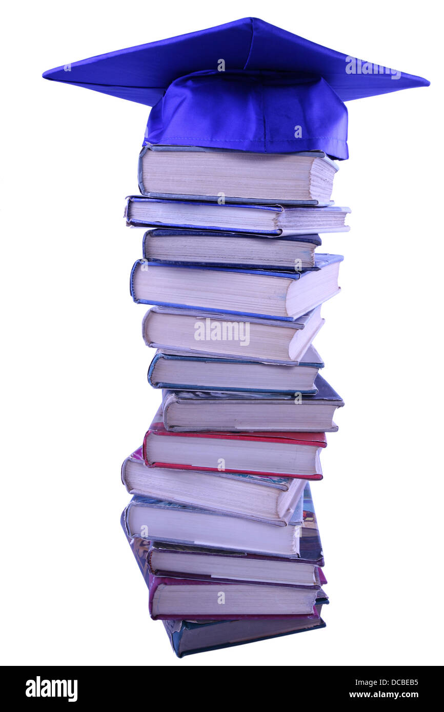 Graduation cap on top of book stack Stock Photo - Alamy