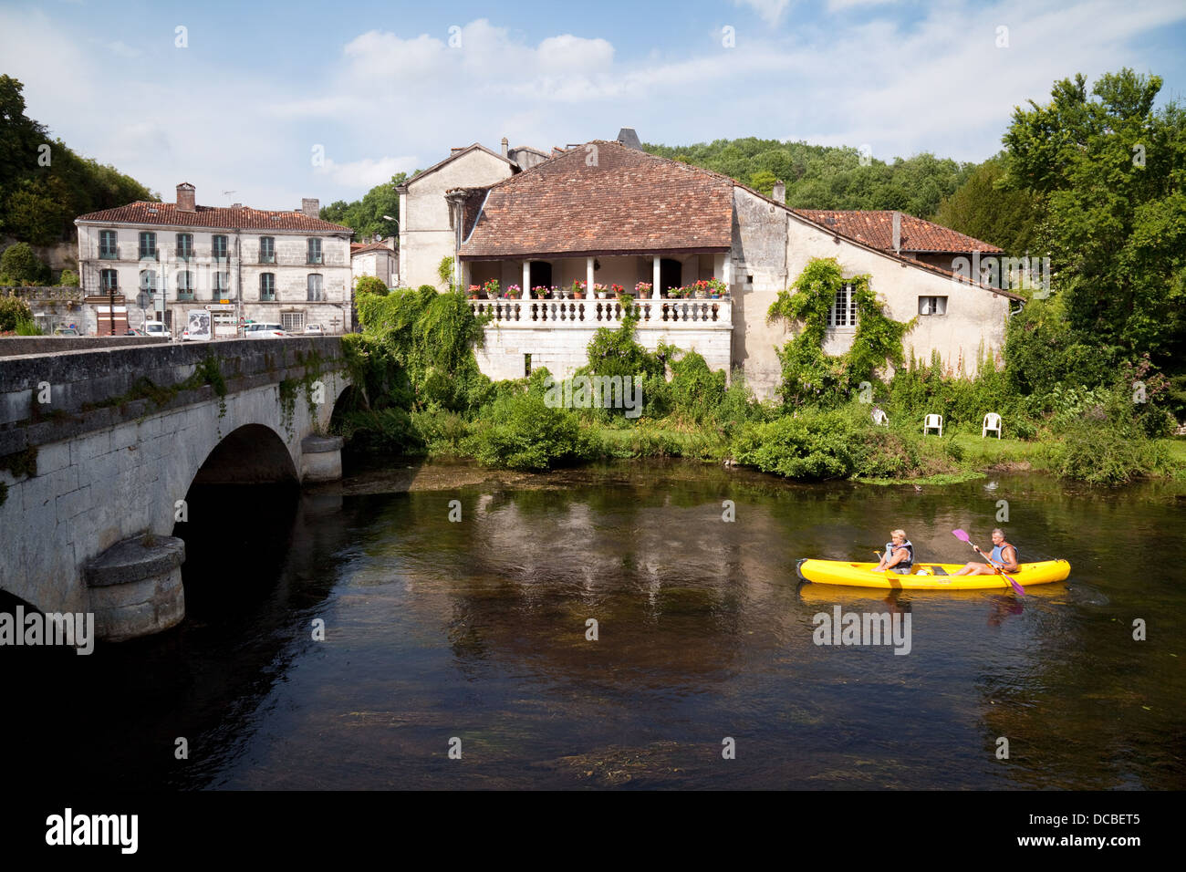 Canoes on the river Dronne at Brantome, the Dordogne, France Europe ...