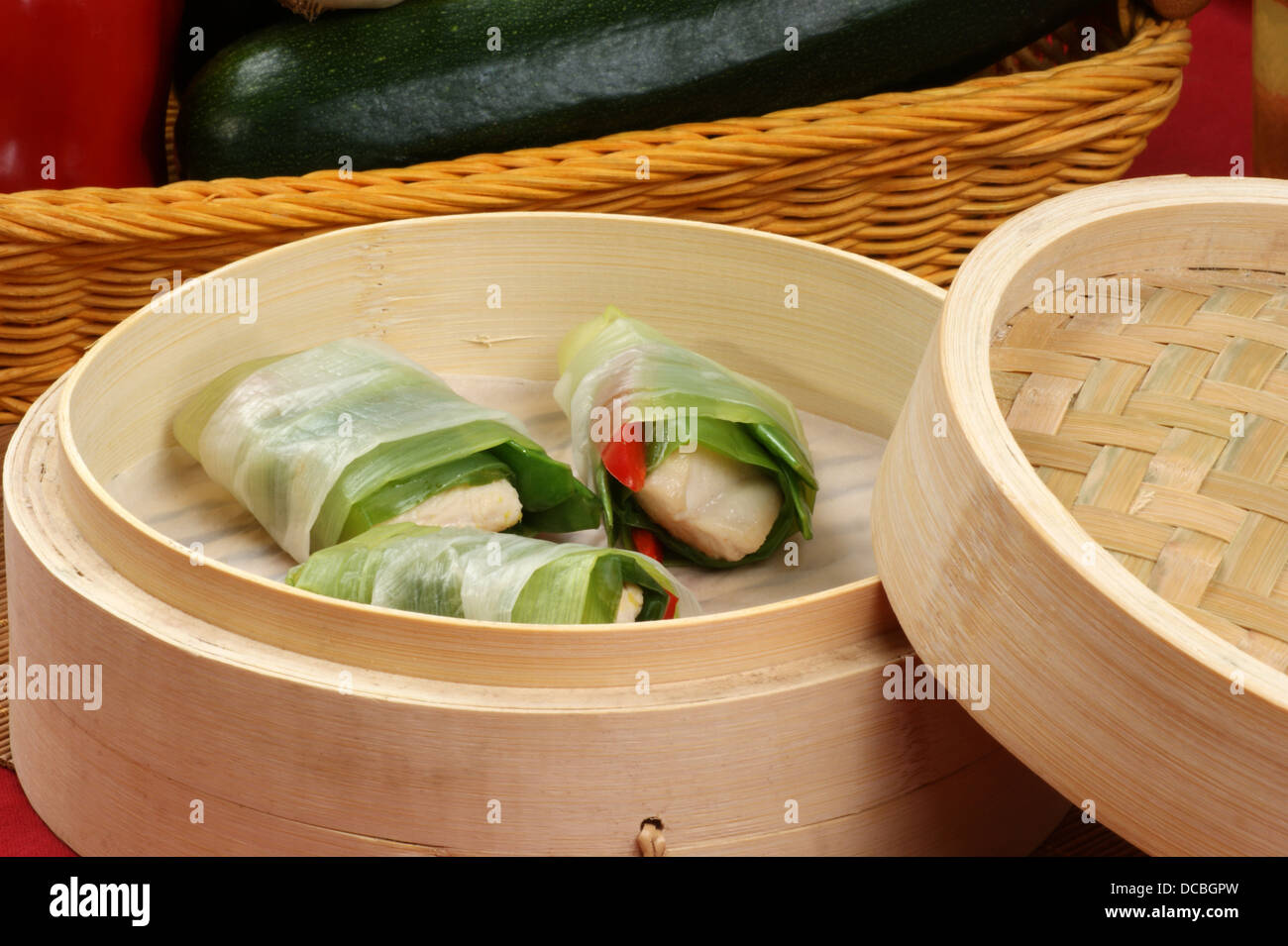 asian style chicken and vegetable bundles Stock Photo - Alamy