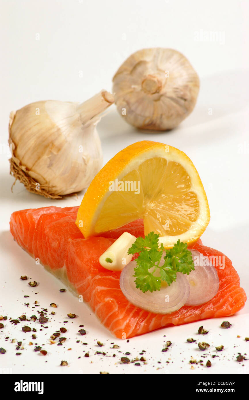 wild irish salmon fillet and lemon, pepper Stock Photo - Alamy