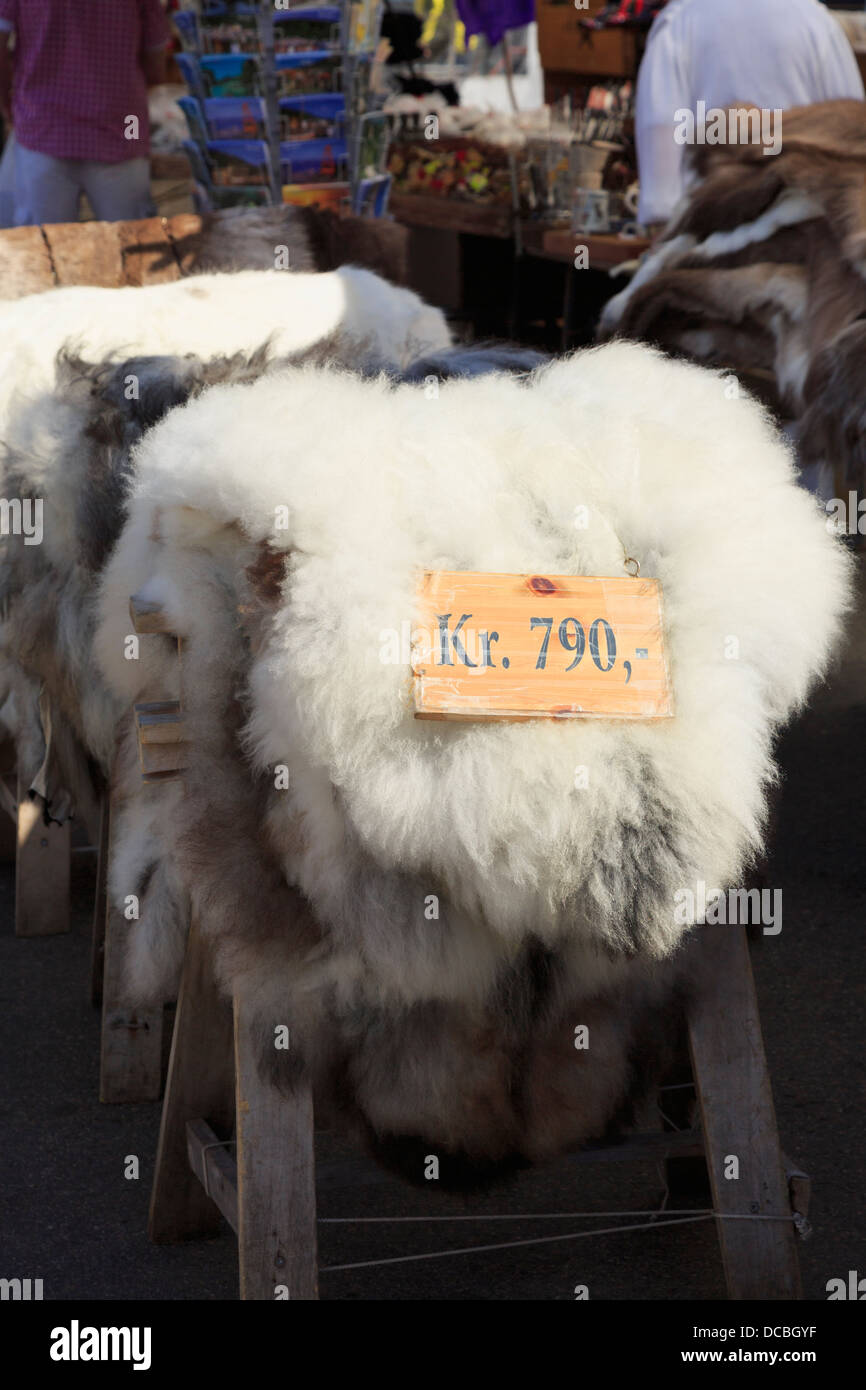 Reindeer fur skins on sale on a market stall in Bergen, Hordaland ...