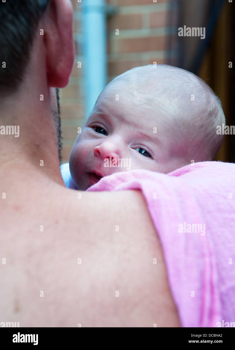 Baby and man hi-res stock photography and images - Alamy