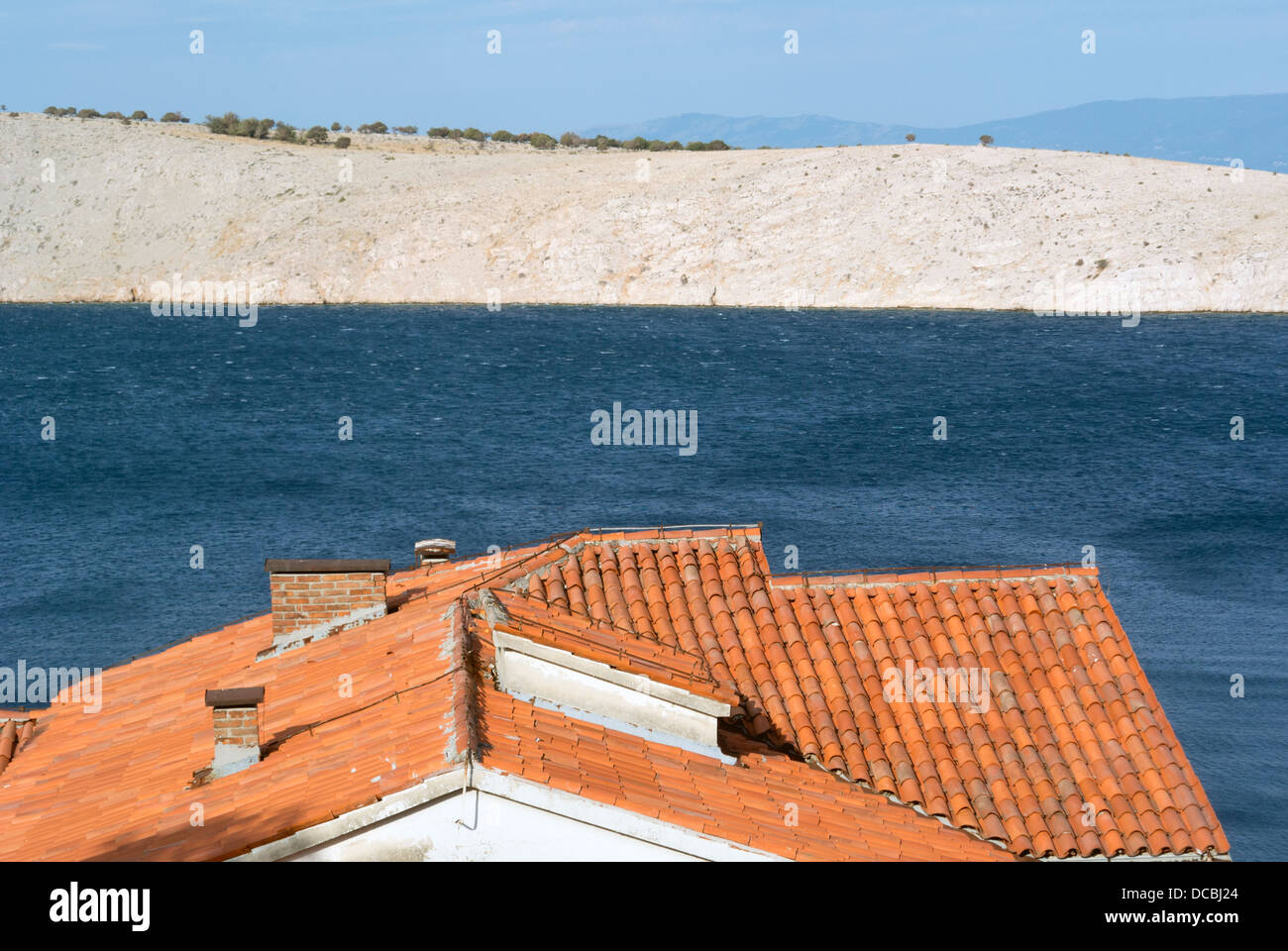 Mediteranean style red roof and tiles. Tourist resort Uvala Scott, near ...