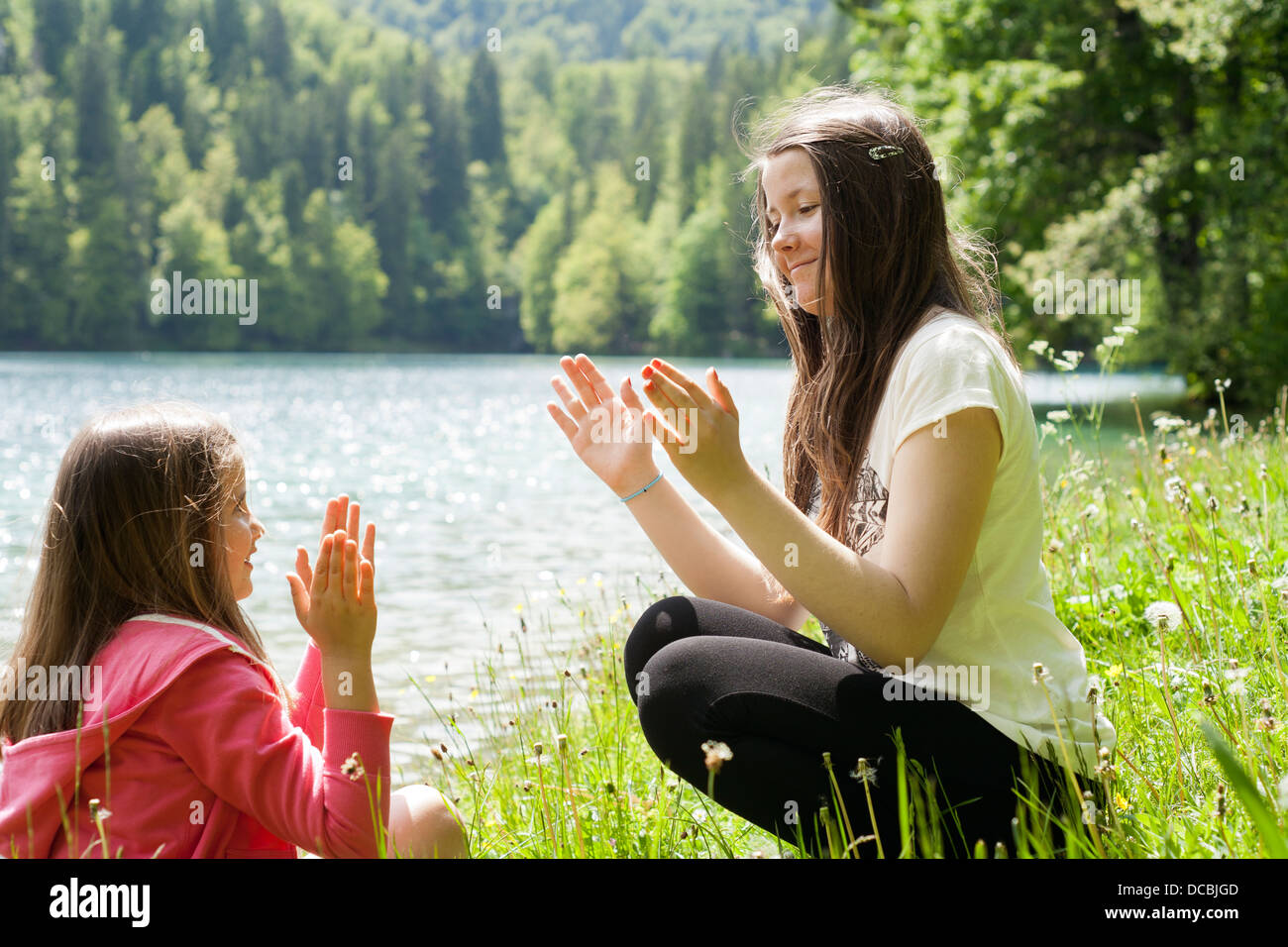 Girls playing outdoor Stock Photo - Alamy