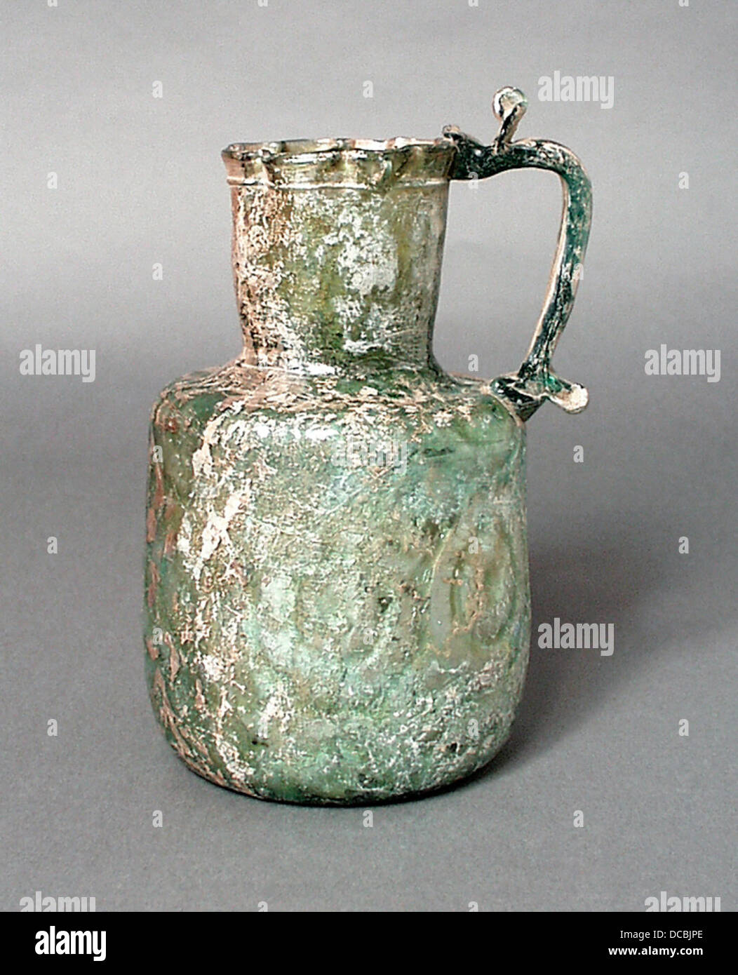 This bronze jug, part of LACMA's collection, features cast decoration ...