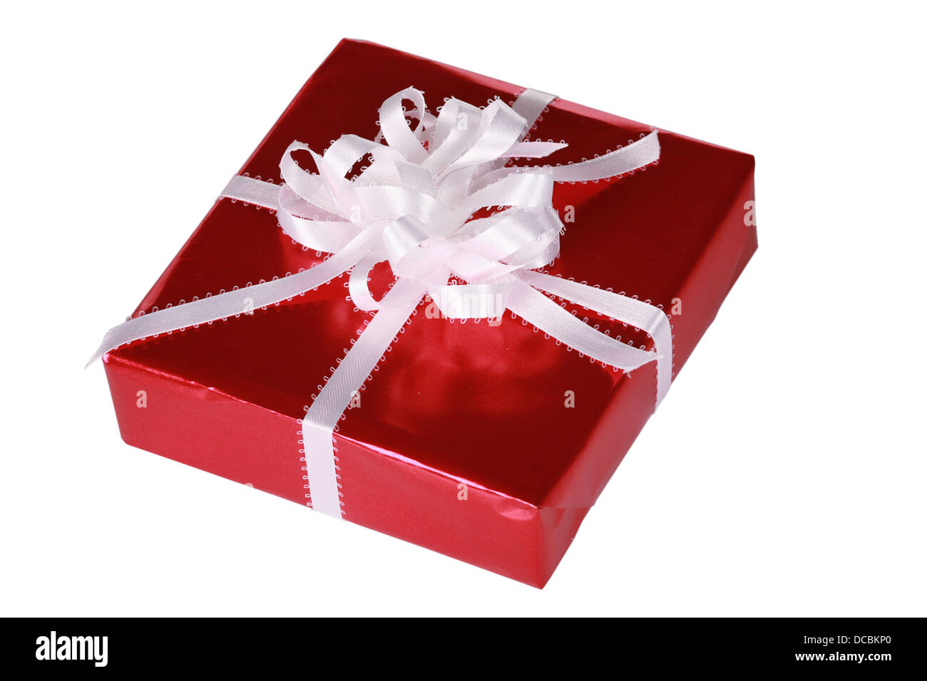 Red present with white bow Stock Photo - Alamy