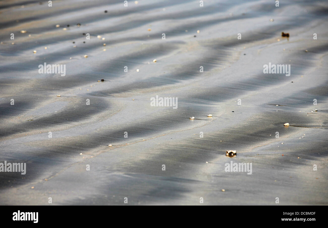 Grey wet sand Stock Photo - Alamy