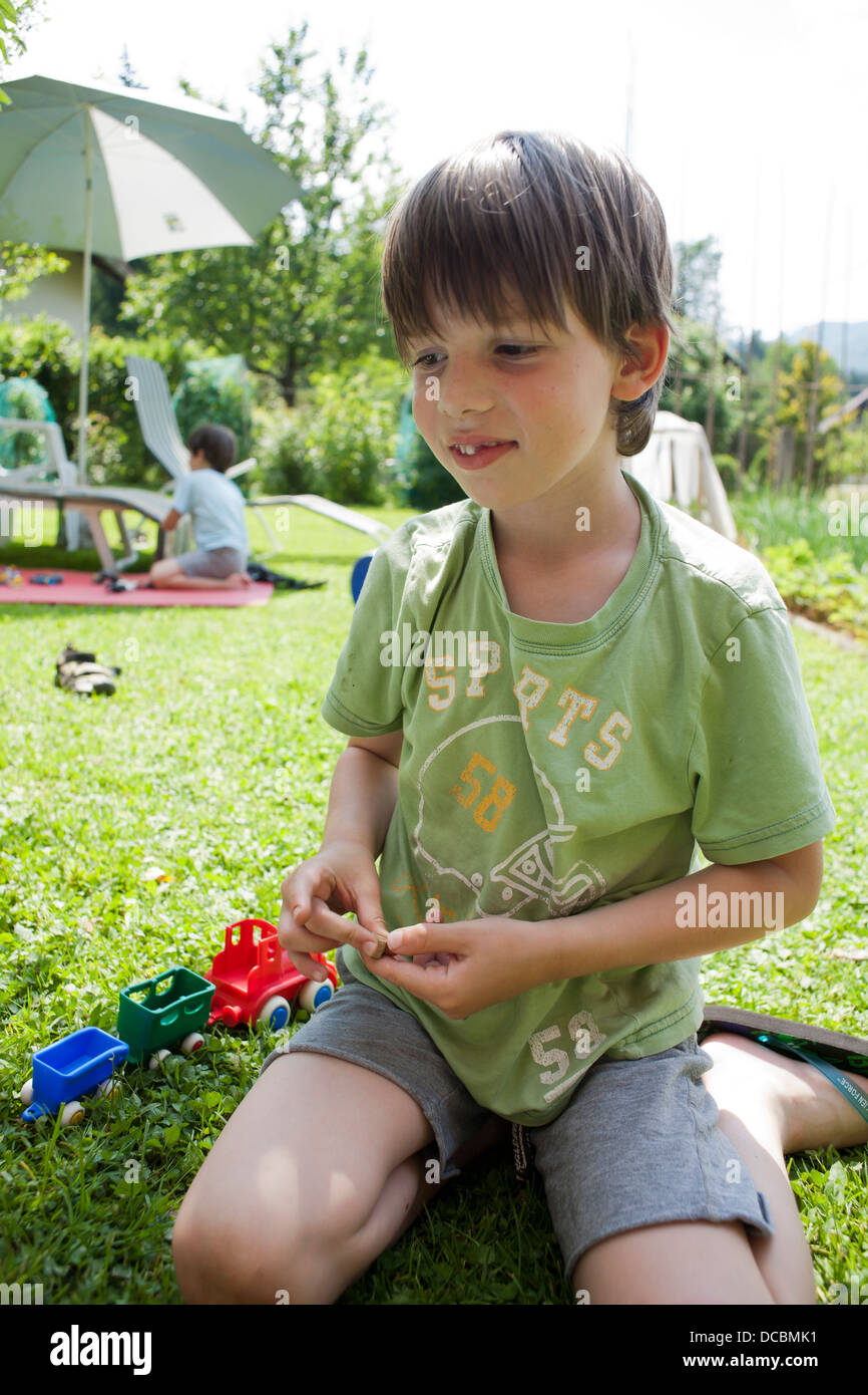Cute boy smiling outdoor hi-res stock photography and images - Alamy