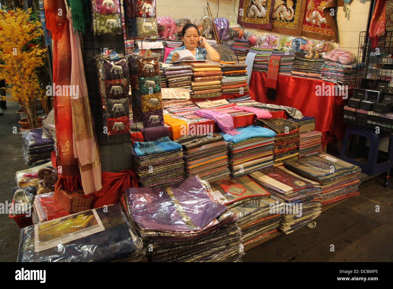 Silks display on stall in Thai silk shop in Chatuchak Weekend Market ...