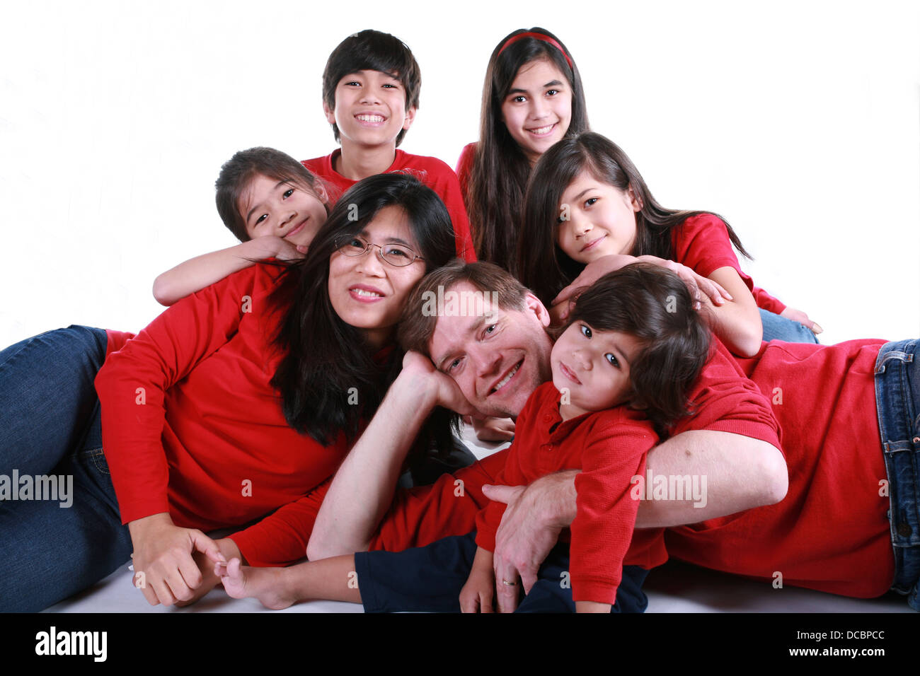 Large family of seven Stock Photo - Alamy