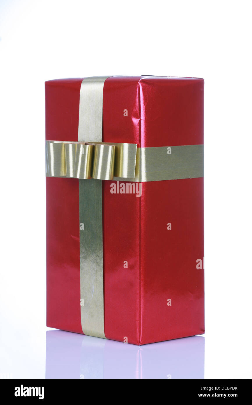 Red gift with gold ribbons Stock Photo - Alamy