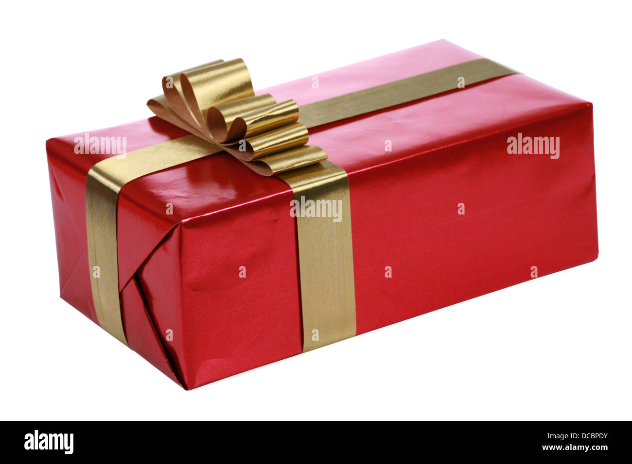 Red gift with gold ribbons Stock Photo - Alamy