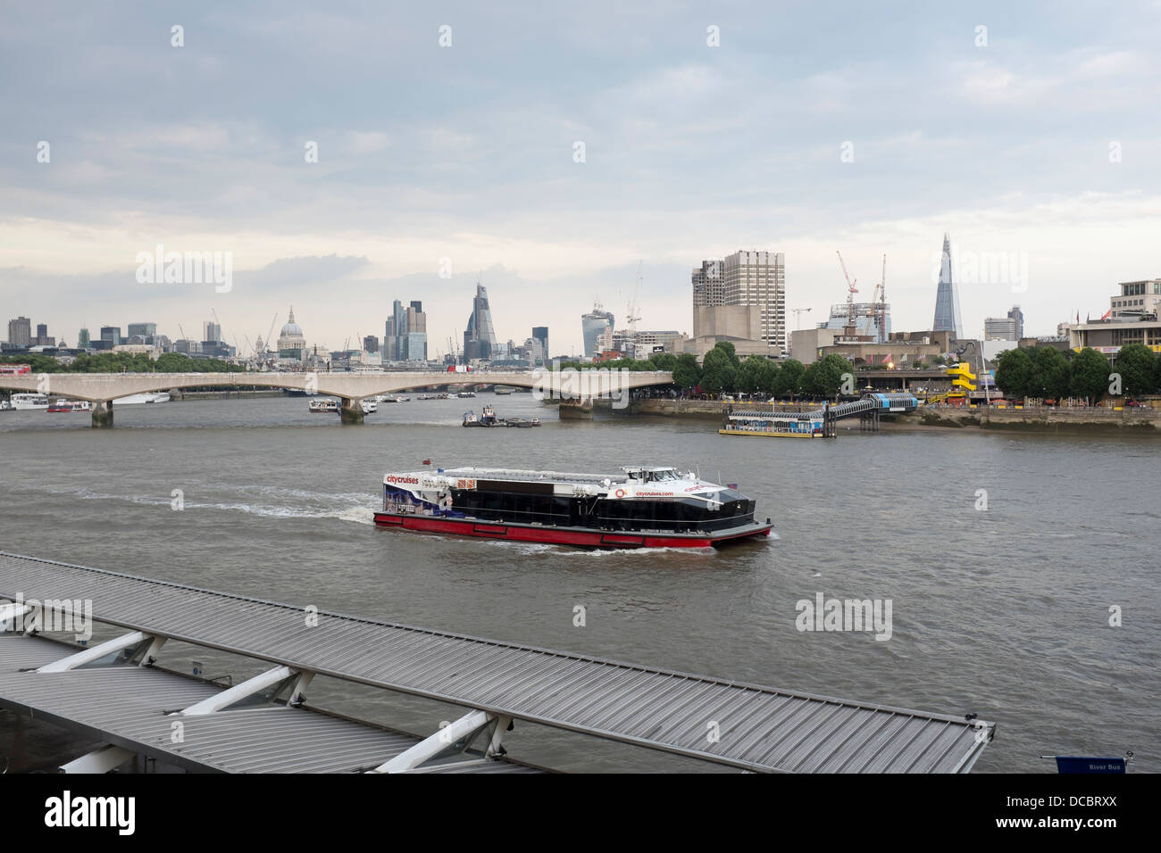 City Skyline with Tourist Riverboat London Stock Photo - Alamy