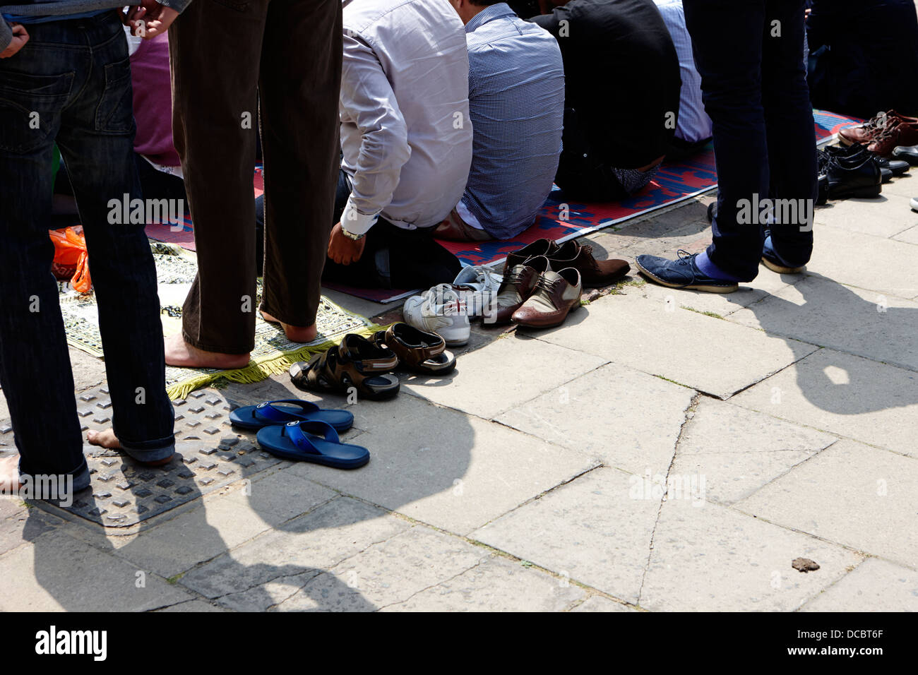 british muslims answer midday call to prayer at mosque in central ...