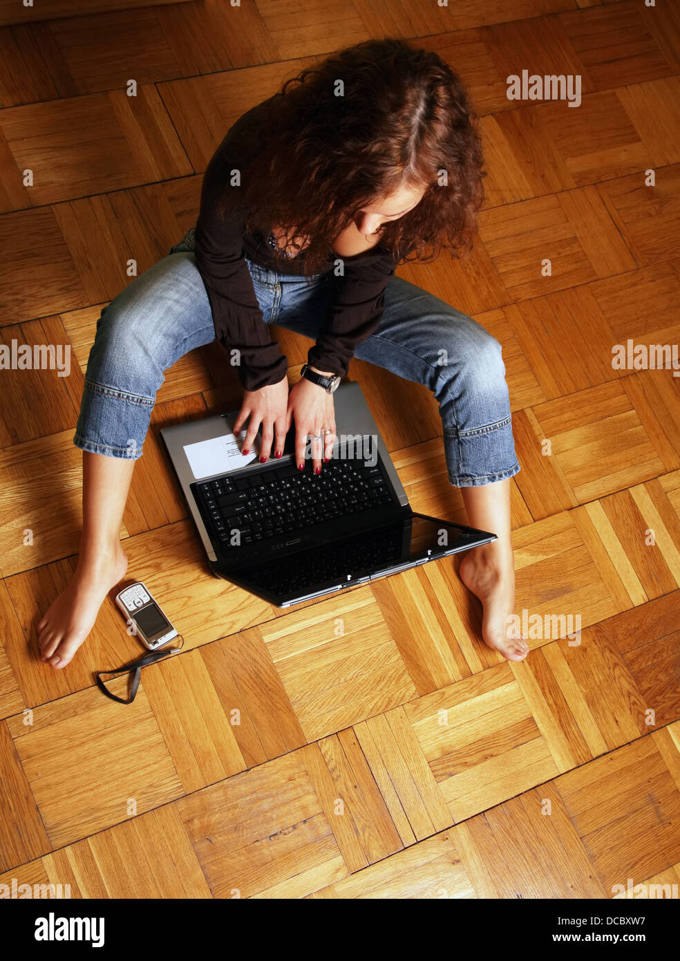 Girl with a computer Stock Photo - Alamy