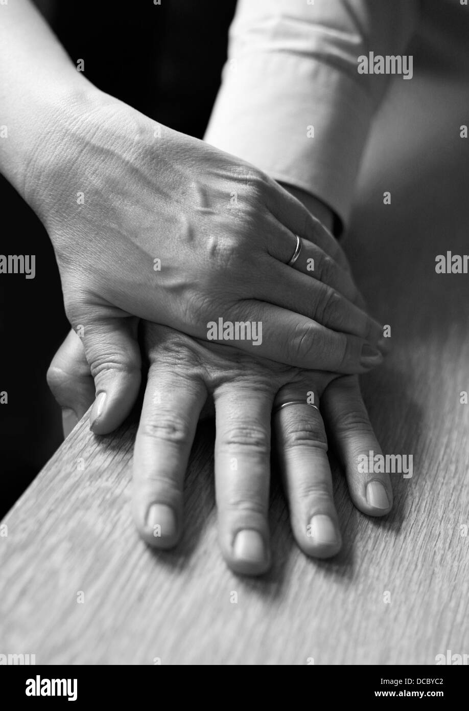 Hands on understanding Black and White Stock Photos & Images - Alamy
