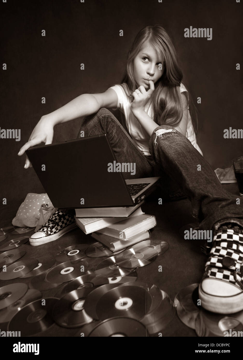 Girl with a computer Stock Photo - Alamy