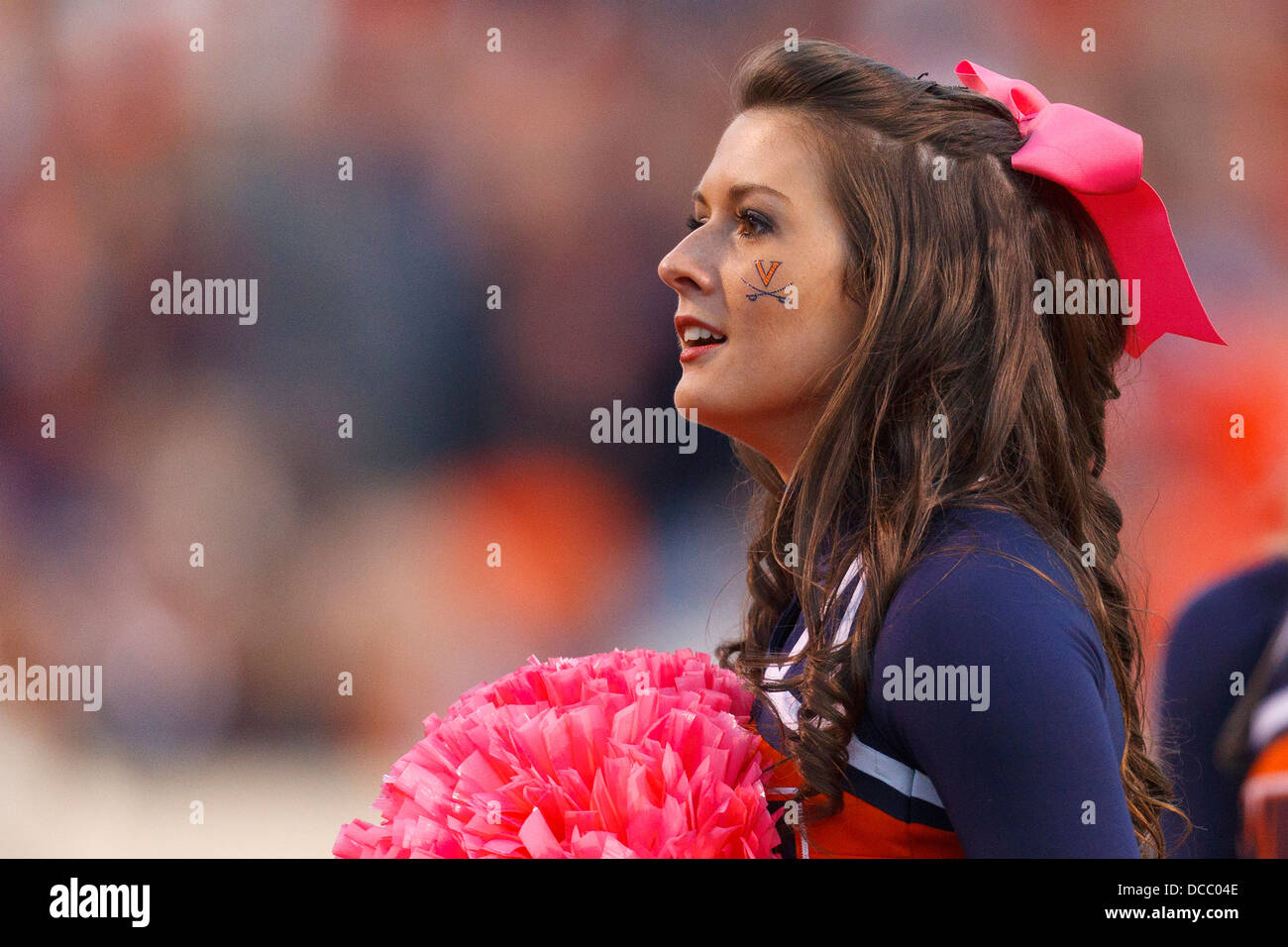 A Virginia Cavaliers cheerleader on the sidelines during the fourth ...