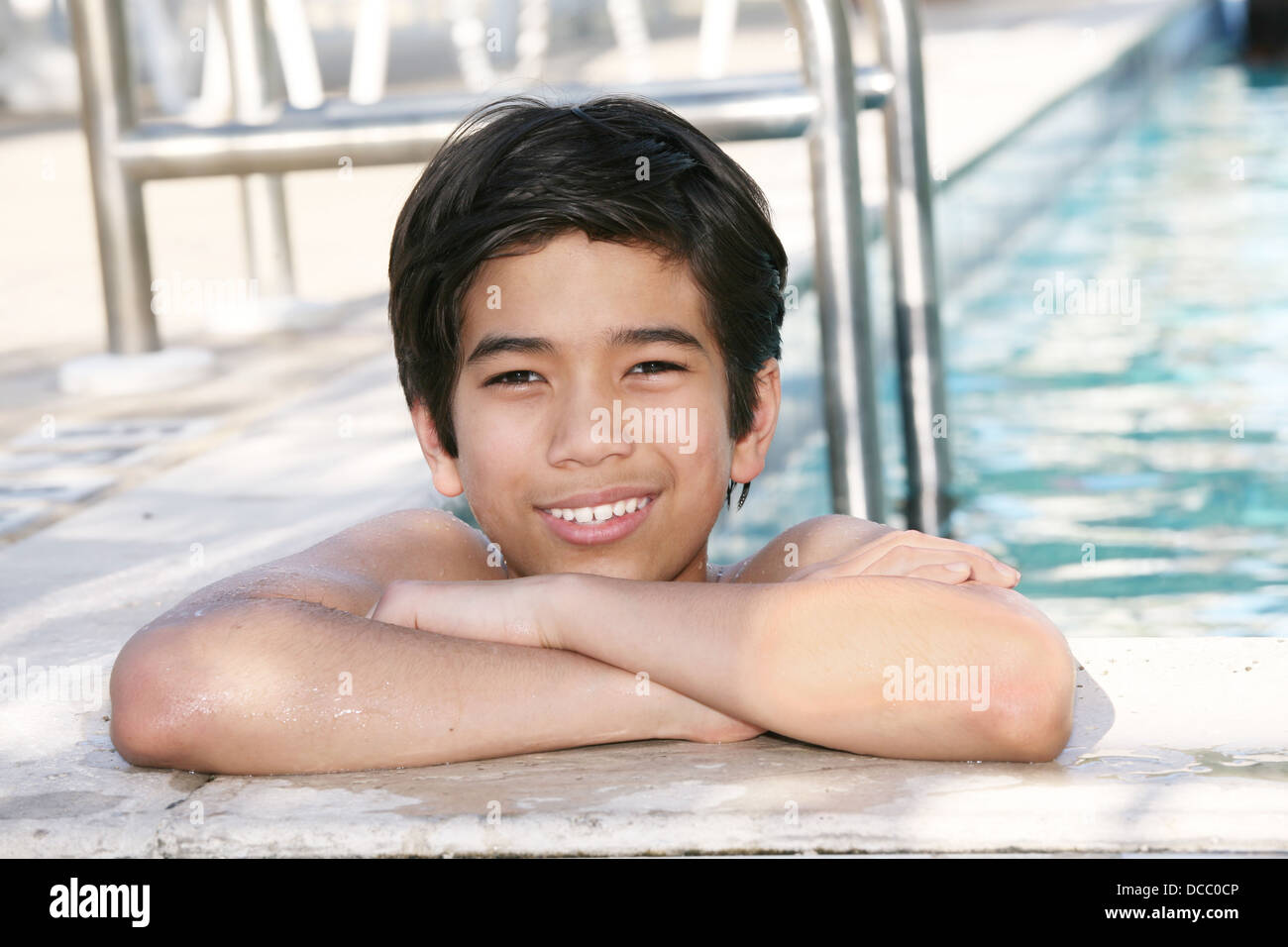 Young boy in the pool Stock Photo - Alamy